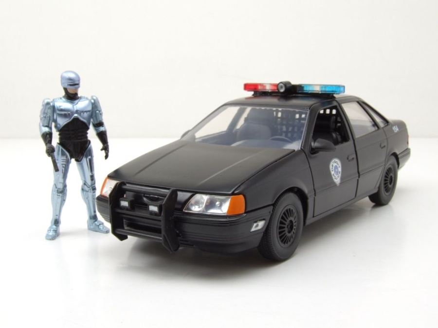 Ford Taurus Police 1986 schwarz RoboCop mit Figur Modellauto 1:24 Jad